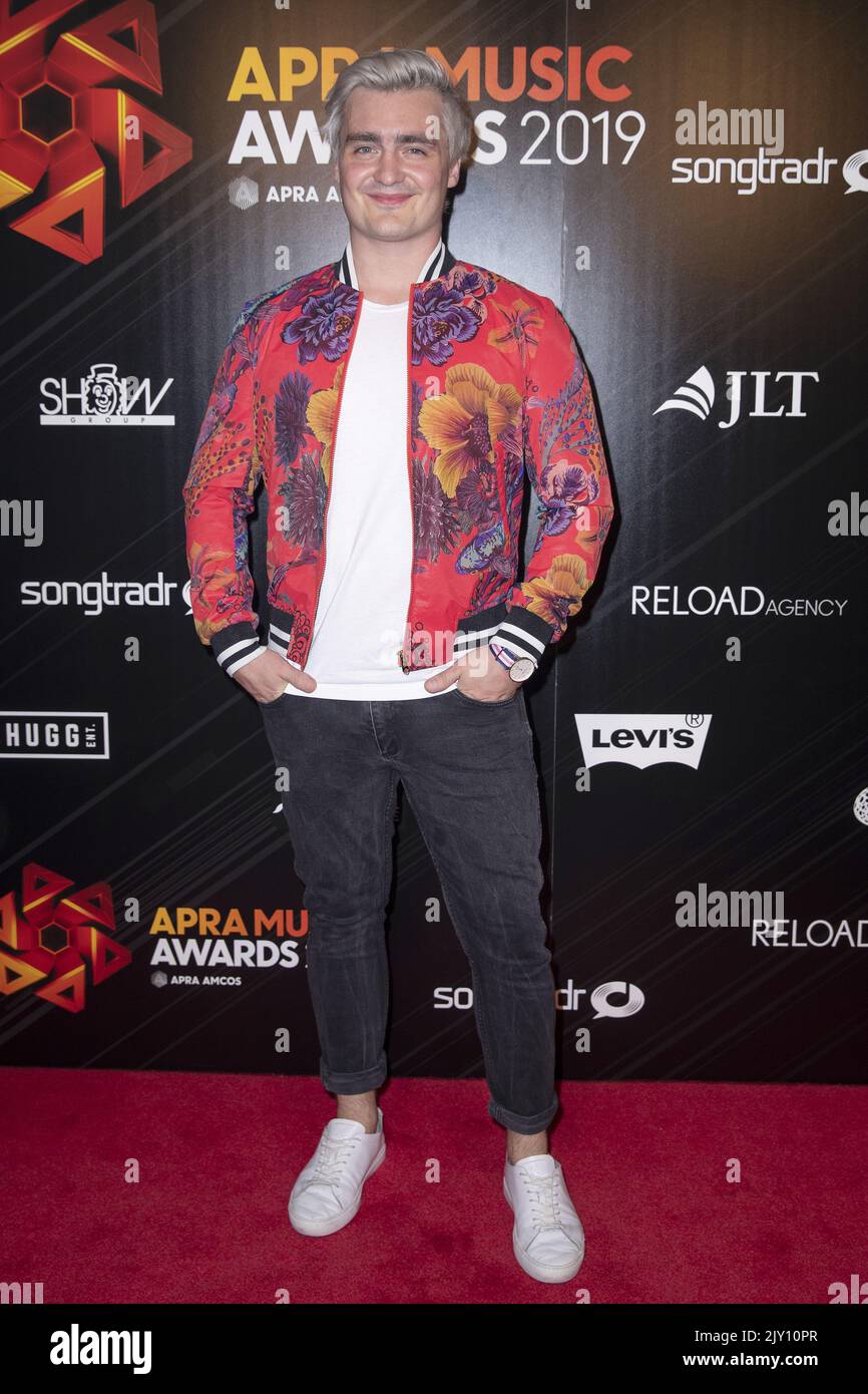 George Sheppard poses for a photograph on the red carpet of the APRA ...