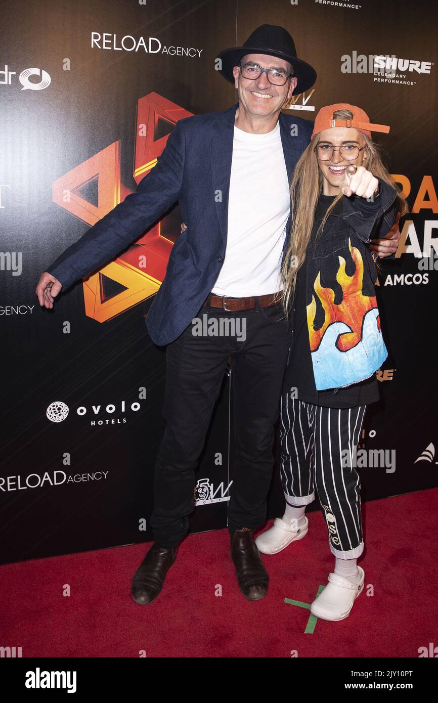 Georgia Flipo, also known as G Flip, and her father pose for a ...