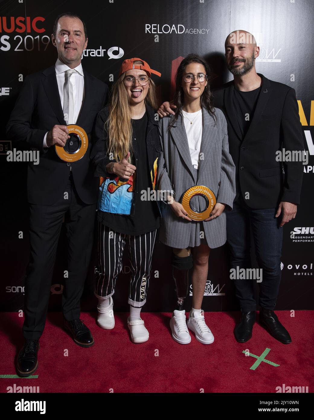 (L-R) Damian Trotter, Georgia Flipo, also known as G Flip, Sarah Aarons ...