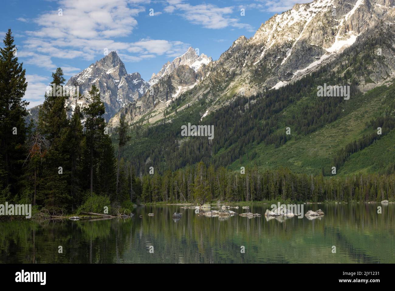The Grand Teton and Teewinot rising high above the surrounding Teton ...