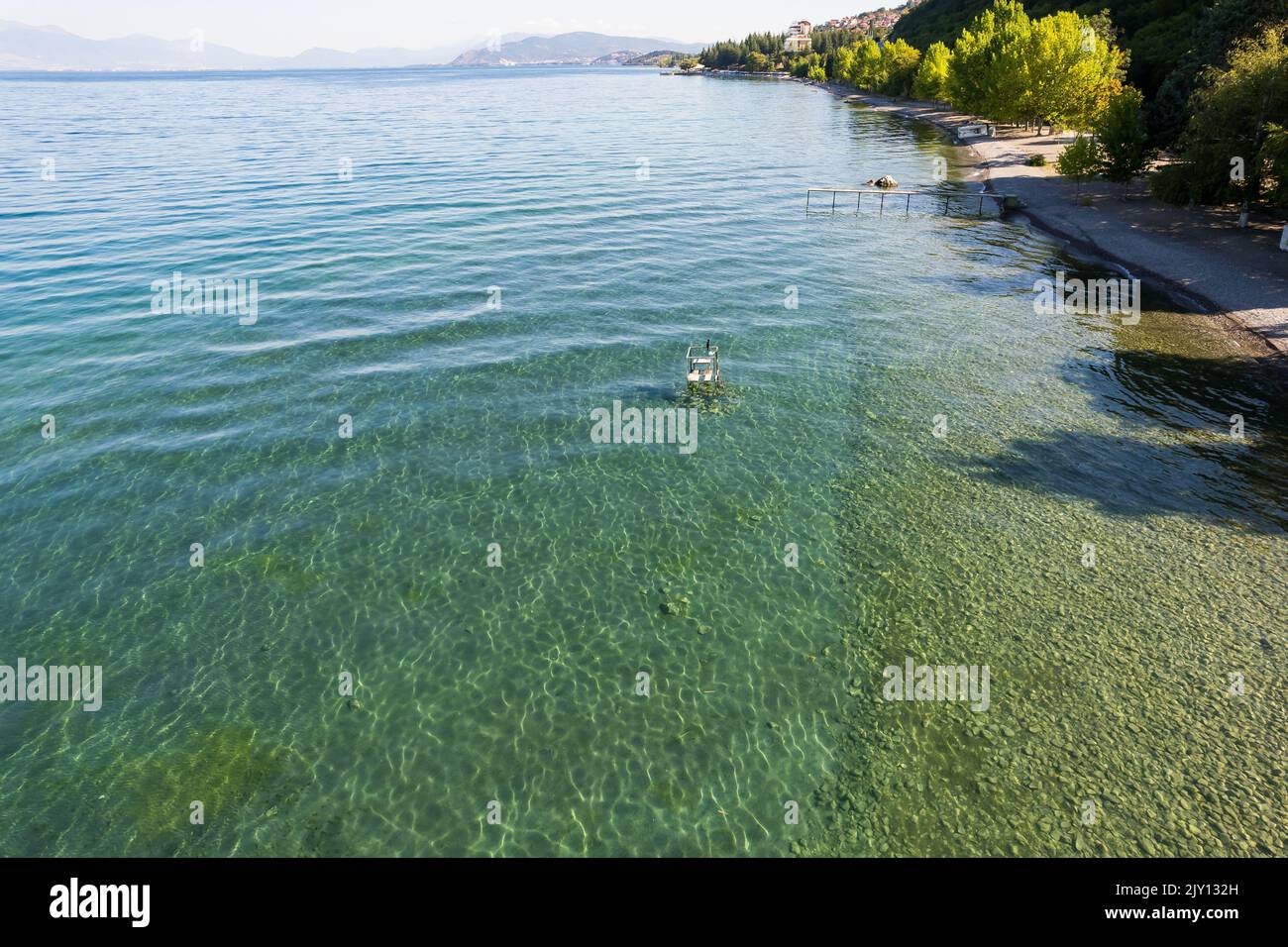 Stony shore of Ohrid lake in Summer, North Macedonia Stock Photo - Alamy