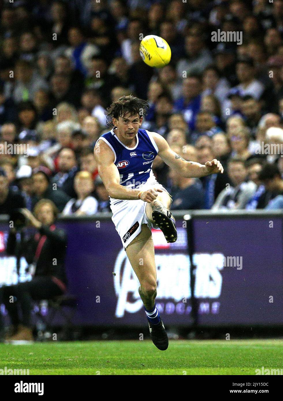 Jasper Pittard of the Kangaroos kicks forward during the Round 7 AFL ...