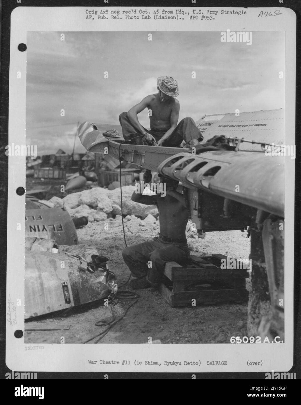 Men Salvage Useable Parts From The Wing Of A Republic P-47N ...
