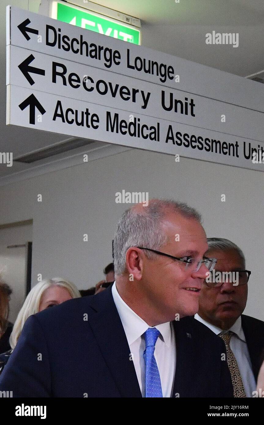 Prime Minister Scott Morrison (centre) with the candidate for Gilmore ...