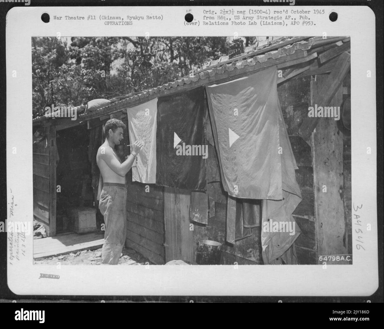 Gi Of The 163Rd Liaison Squadron, 10Th Army Painting Alert Warning ...