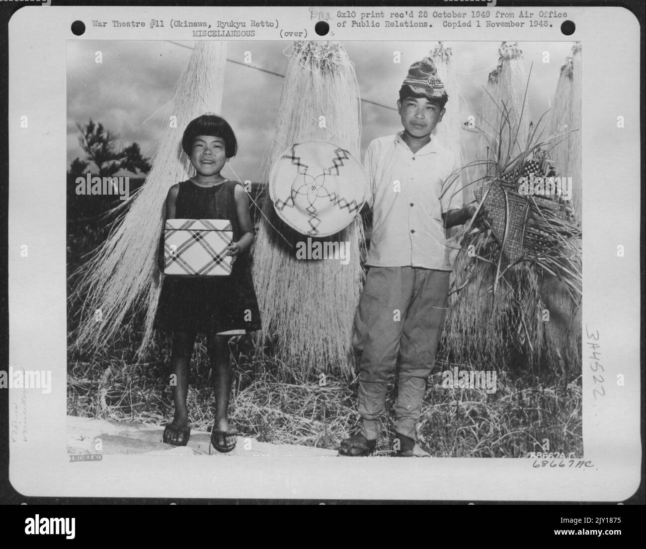 Grass skirts Black and White Stock Photos & Images - Alamy