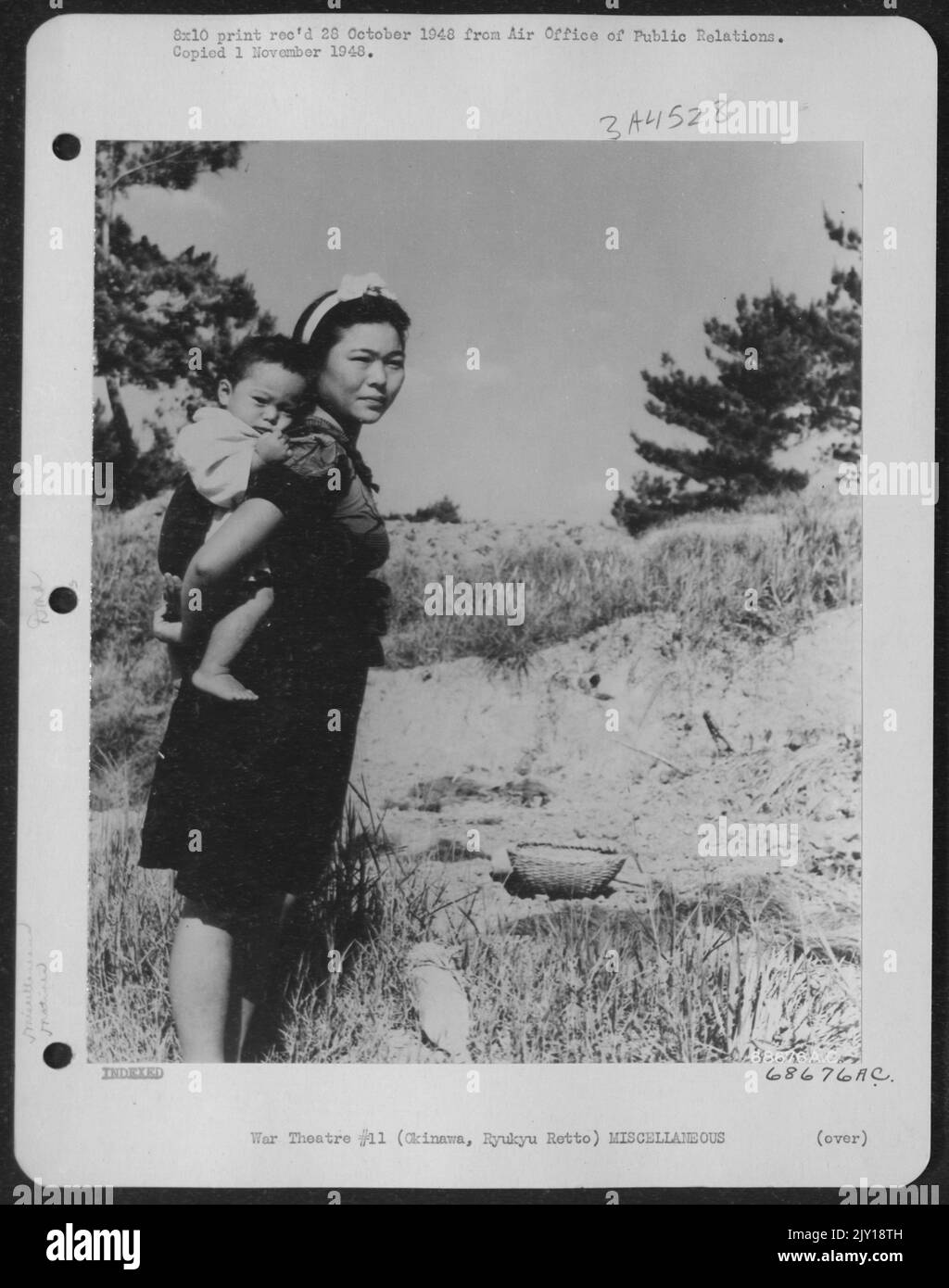 Mother And Child - Okinawa Style - With Baby Strapped To Her Back In ...