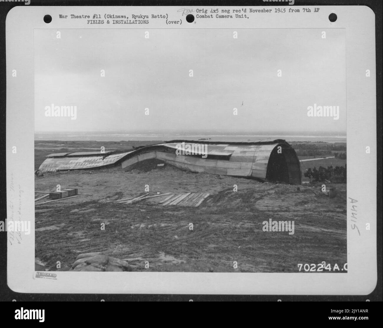 A Tropical Typhoon Damaged The Quonset Hut Of The 7Th Air Force ...