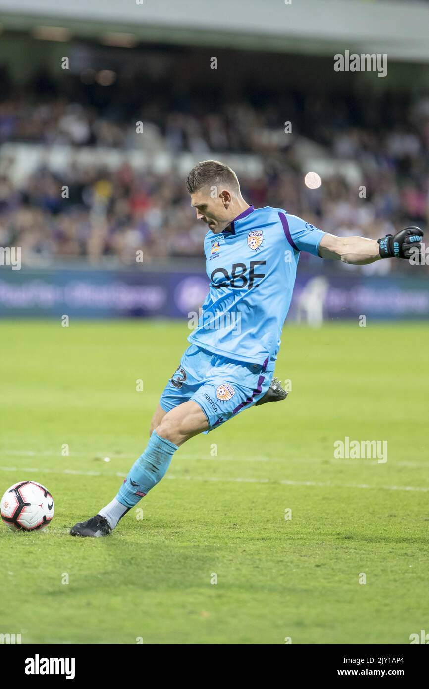 Perth Glory goalkeeper Liam Reddy kicks on goal during the penalty ...
