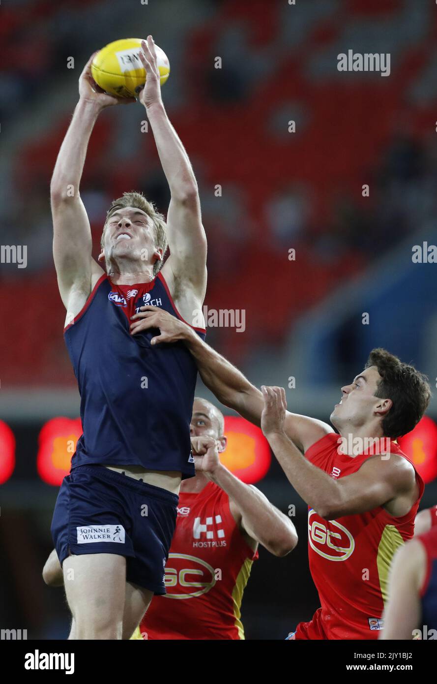 Oscar McDonald of Demons marks against the Suns during Round 8 of AFL ...