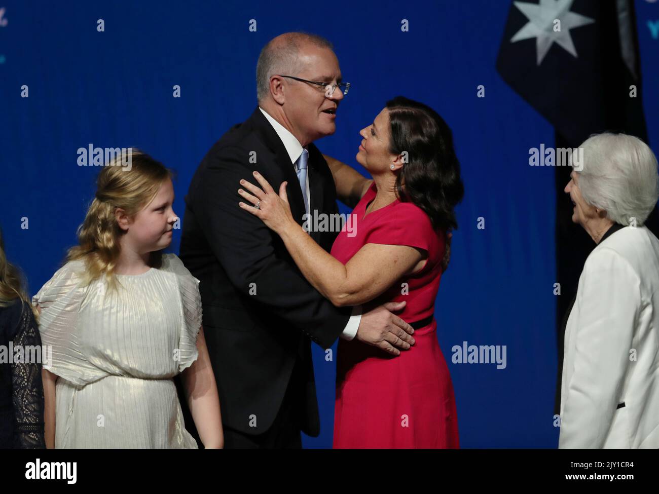 Prime Minister Scott Morrison embraces his family, his wife Jenny ...