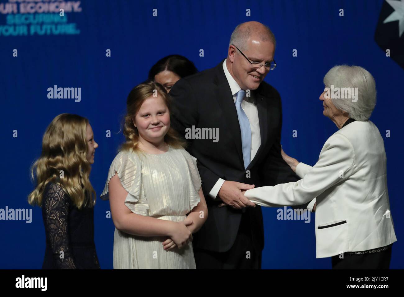 Prime Minister Scott Morrison embraces his family, his mother Marion ...