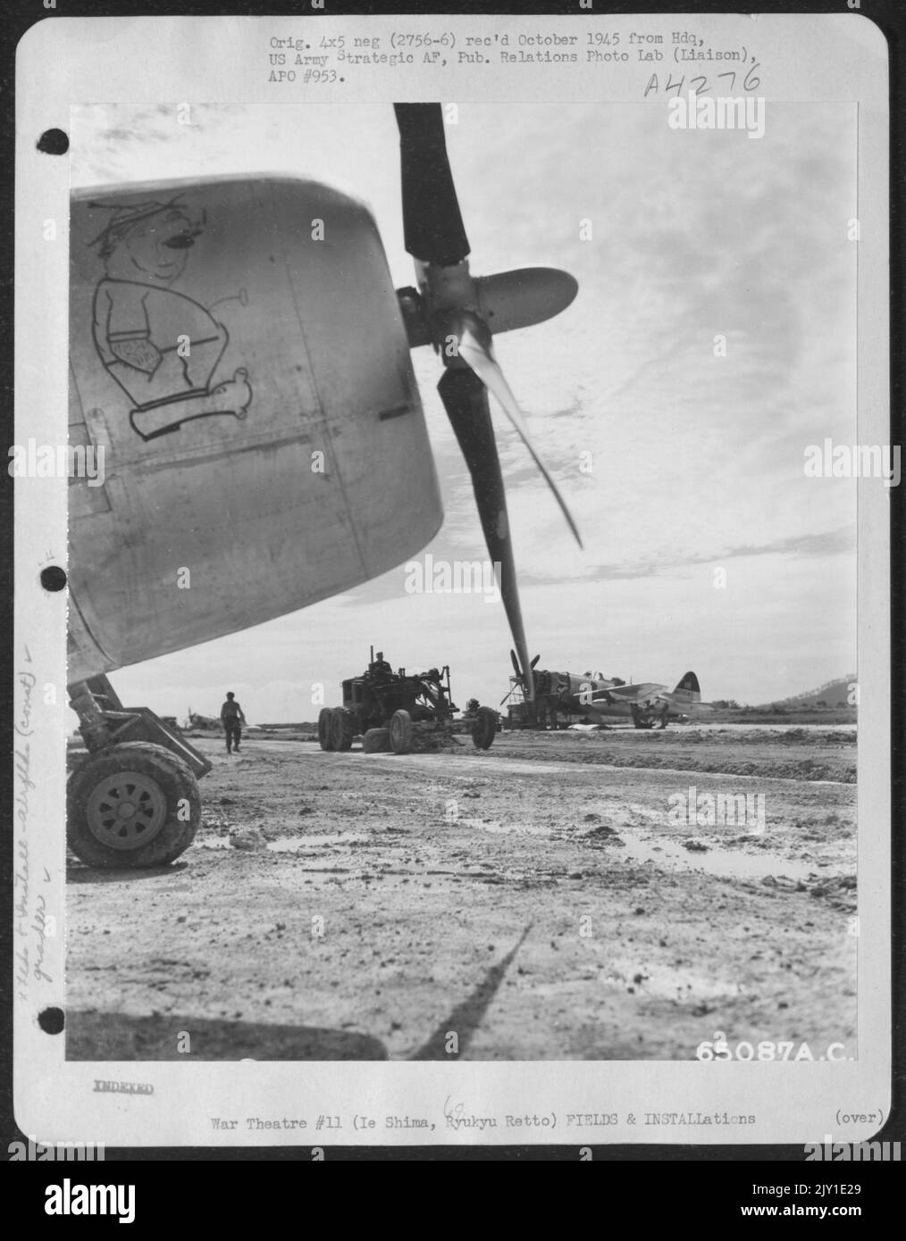 A Grader, Operated By A Member Of An Engineer Aviation Battalion ...