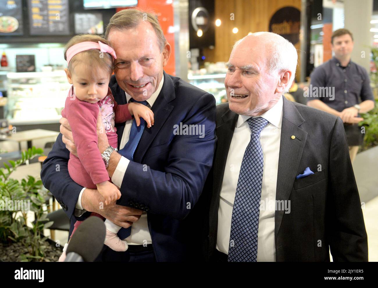Former Australian prime ministers John Howard and Tony Abbott are seen ...