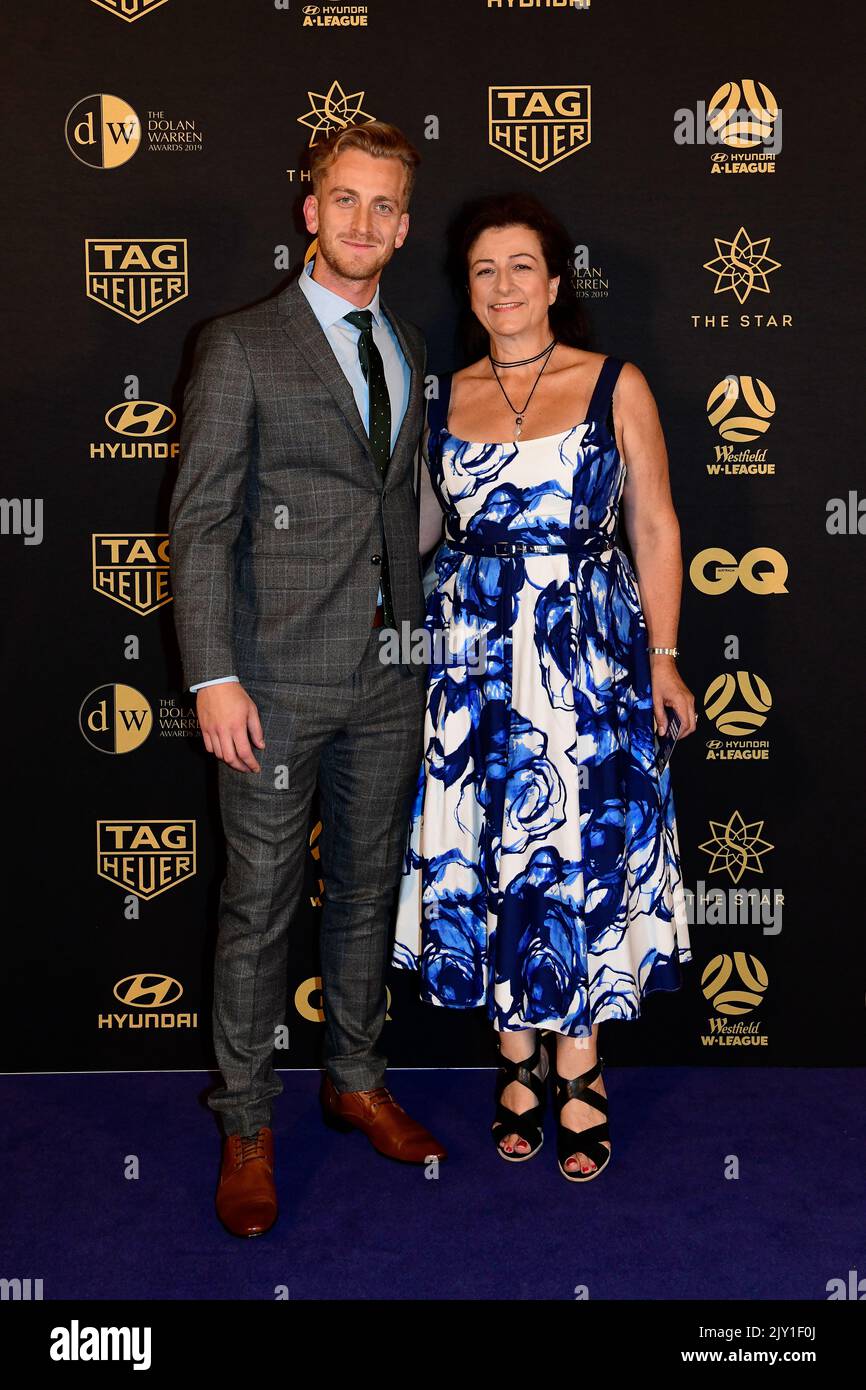 A-League player Lawrence Thomas (left) and mum Linda Thomas pose for a ...