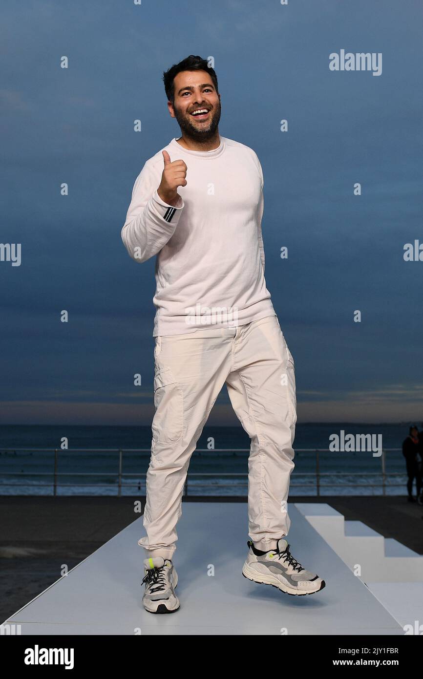 American designer Jonathan Simkhai gestures following his show during ...