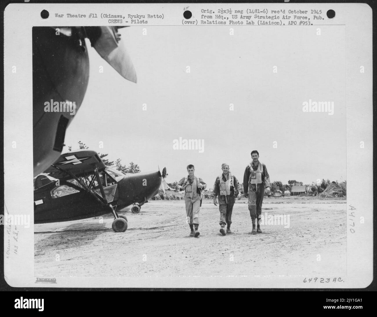 Three Pilots Of Vultee L-5's Walk Toward Their Planes, Parked On The ...
