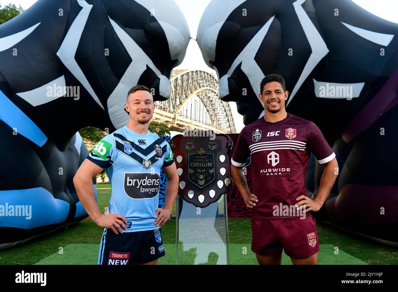 NSW Blues player Damien Cook (left) and Queensland Maroons player Dane ...