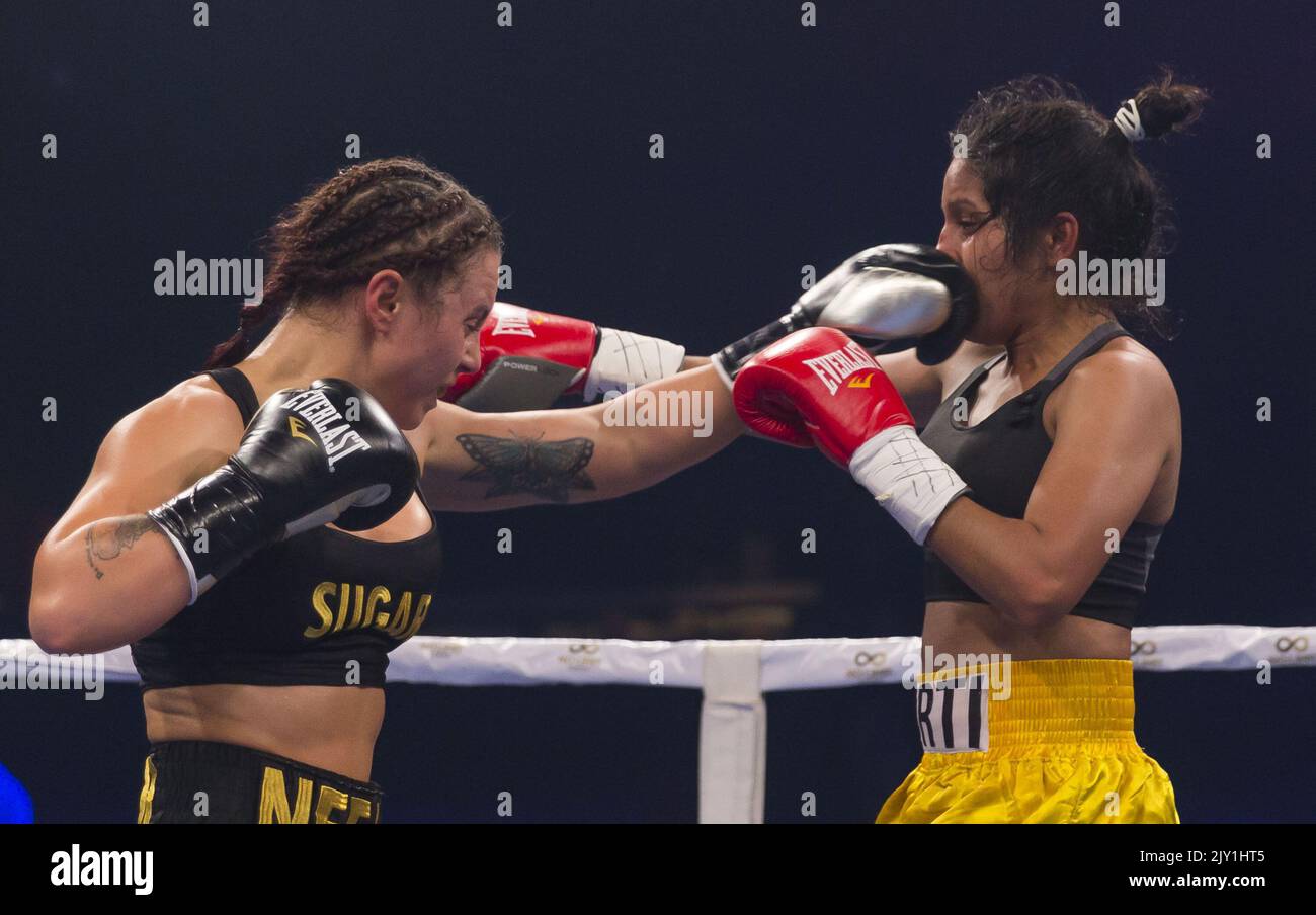 Cherneka Johnson (left) and Kirti during their bout at The Star Casino ...