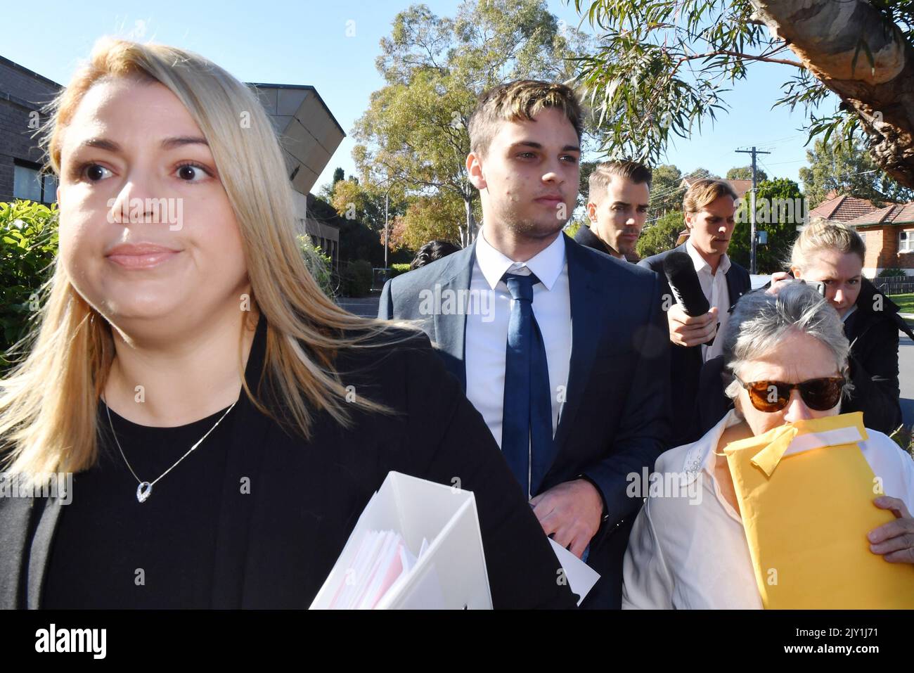 Max Town (centre) leaves the Sutherland Local Court south of Sydney ...