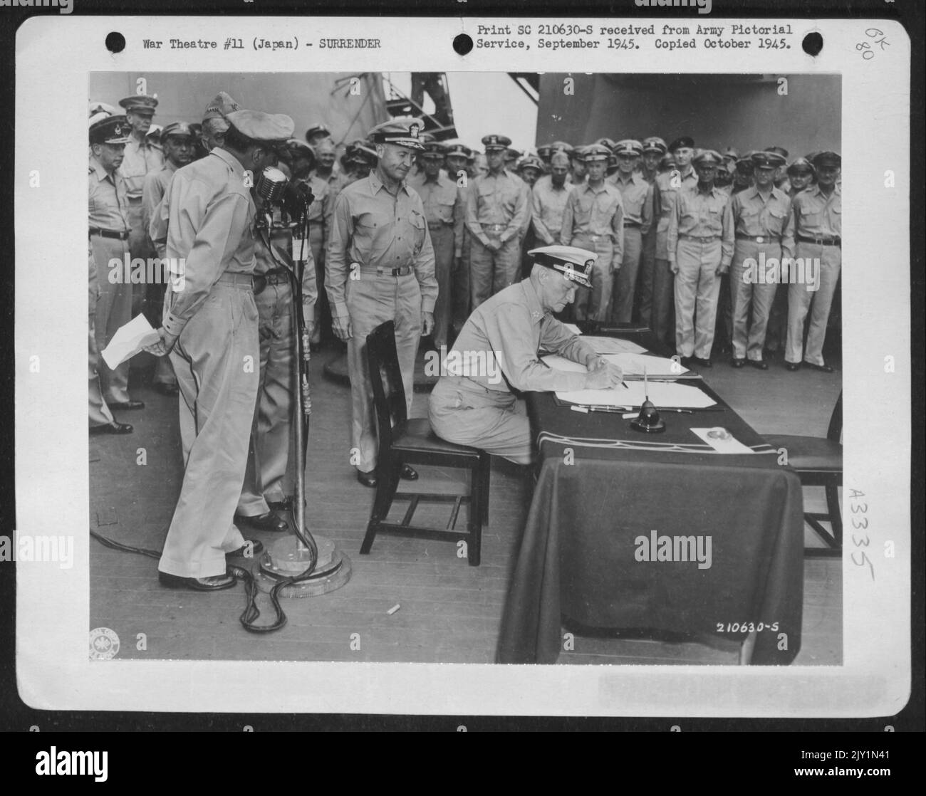 Fleet Admiral Chester W. Nimitz Signs For The United States During The ...