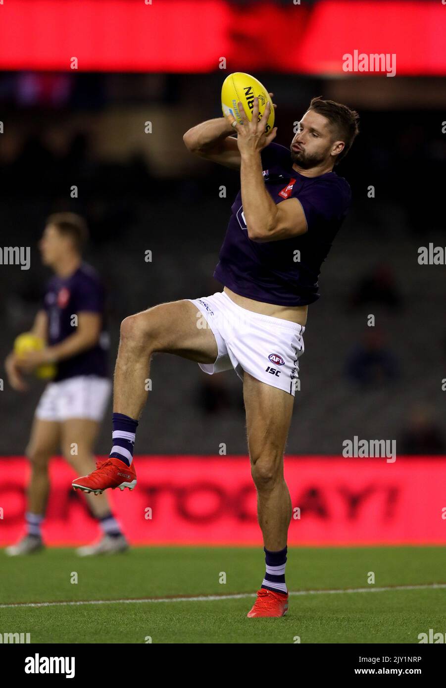 Jesse Hogan of the Dockers warms up ahead of the Round 9 AFL match ...