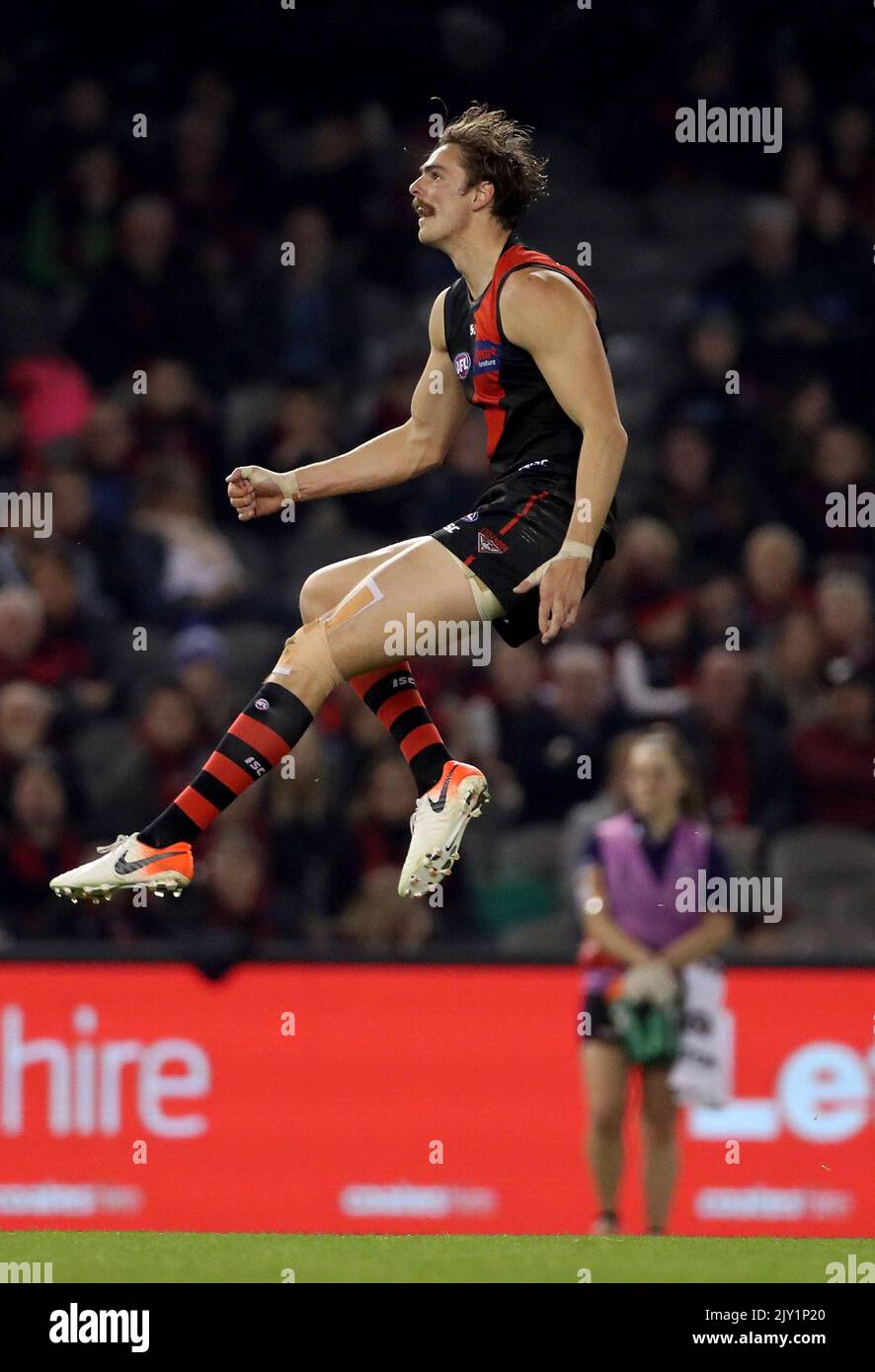 Joe Daniher of the Bombers kicks for goal during the Round 9 AFL match ...