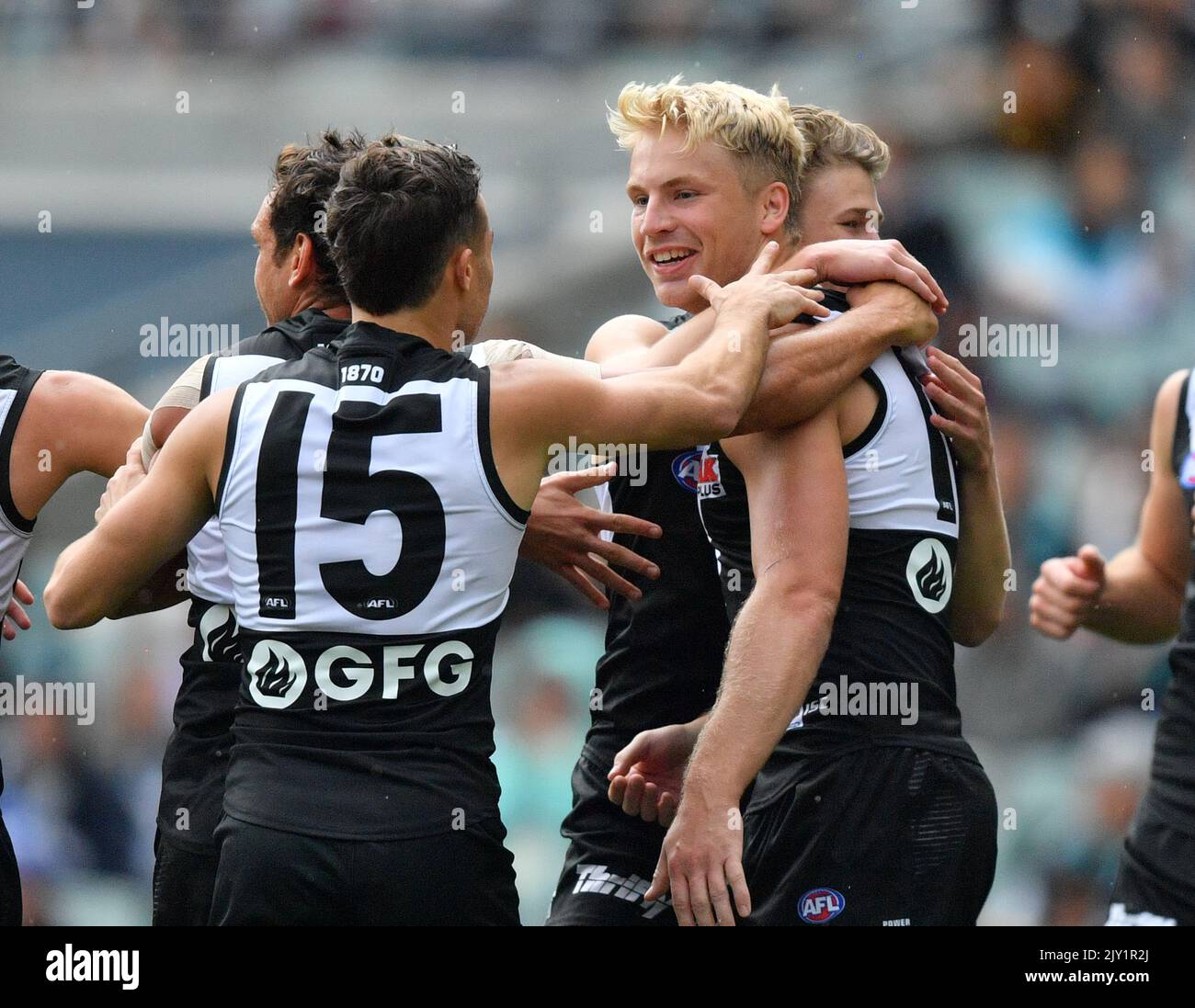 Power players celebrate a goal by Billy Frampton during the Round 9 AFL ...