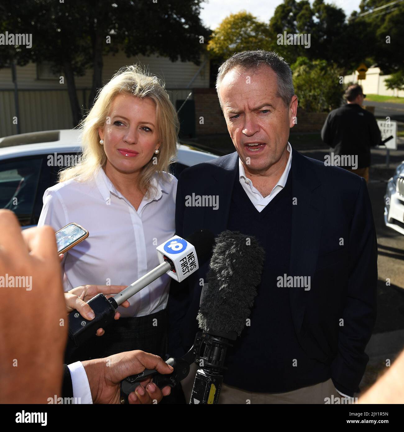 Federal leader of the Opposition Bill Shorten (right) speaks to media ...