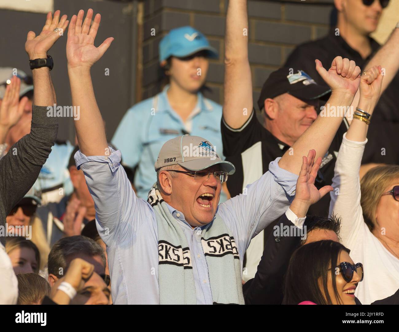 Newly reelected Prime Minister Scott Morrison celebrates a Sharks try ...