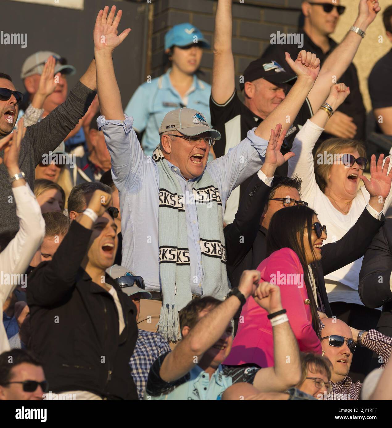 Newly reelected Prime Minister Scott Morrison celebrates a Sharks try ...