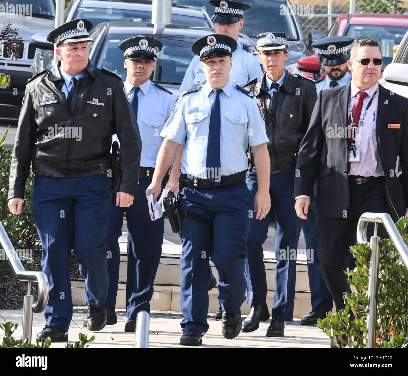 Senior Constables Frederick Tse (second from left) and Jakob Harrison ...
