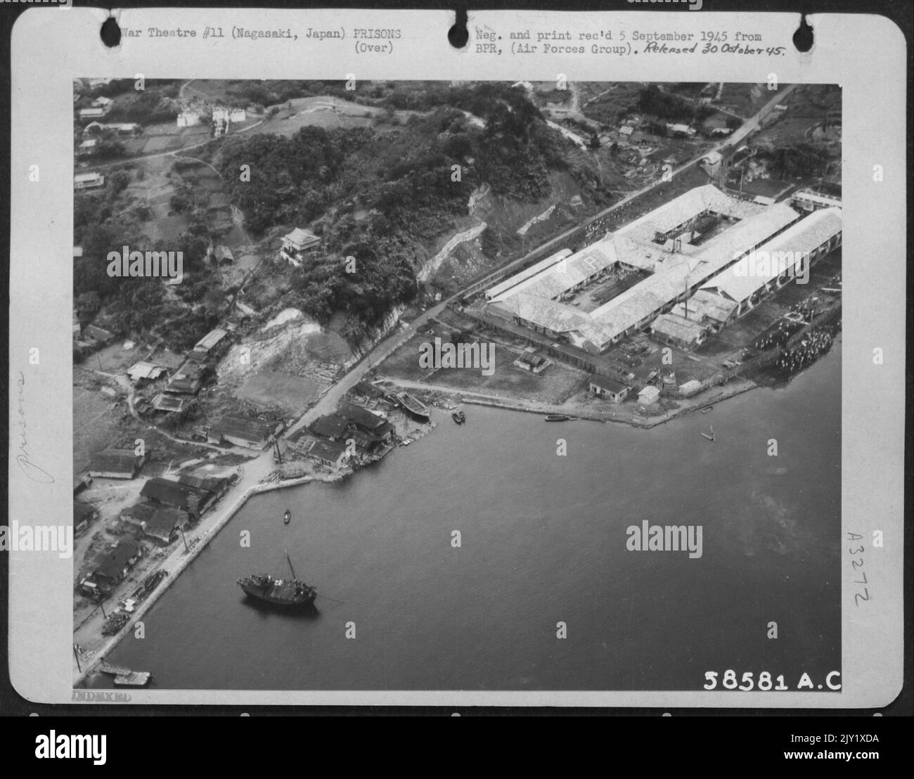 A Prisoner Of War Camp Just South Of Nagasaki, Japanesean. A Flag ...