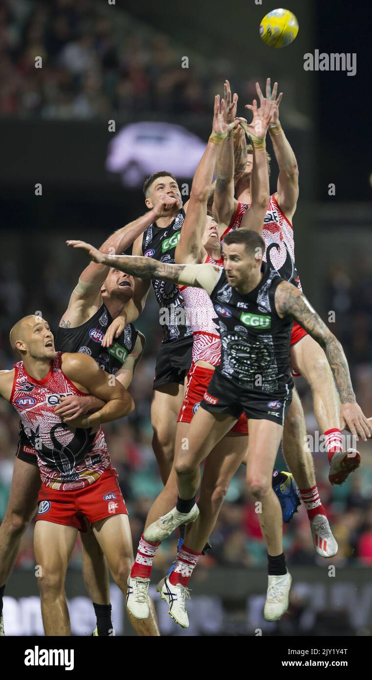 Teams go up for a mark during the Round 10 AFL match between the Sydney ...