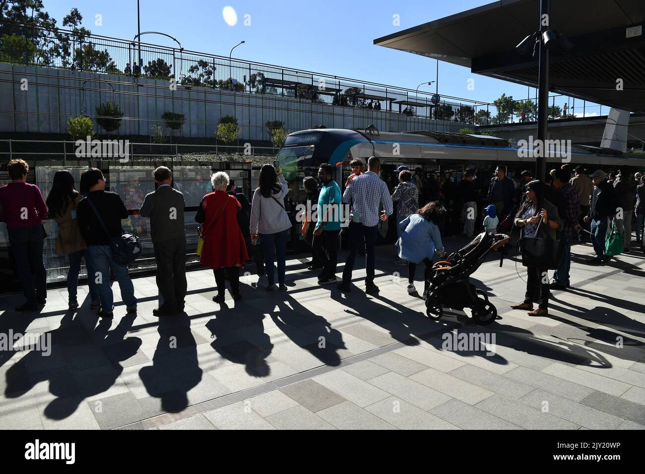 Passengers wait to board a North West Metro train at Tallawong Station ...