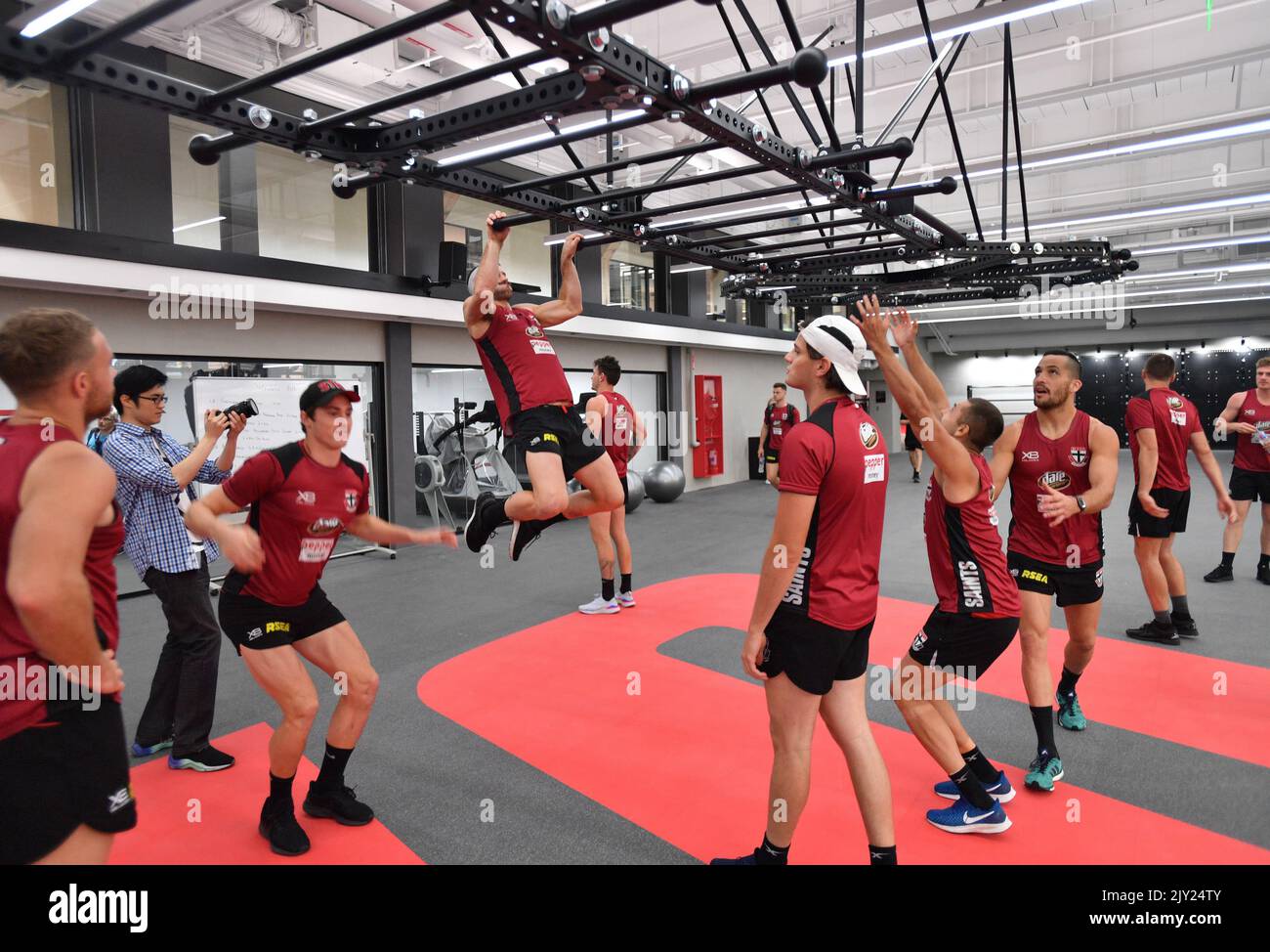 St Kilda Saints players are seen during a tour of the UFC gymnasium ...