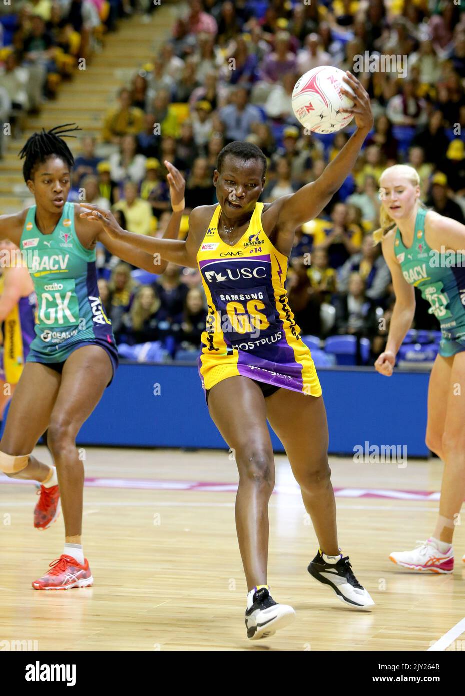 Peace Proscovia of the Lightning with the ball and Kadie-Ann Delaney of ...
