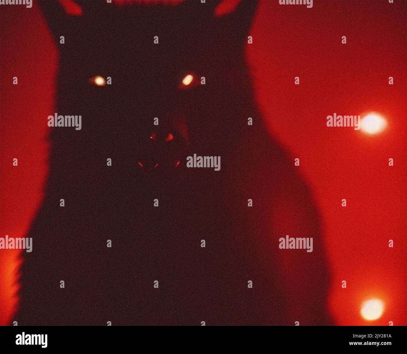 A terrifying werewolf with glowing red eyes Stock Photo - Alamy