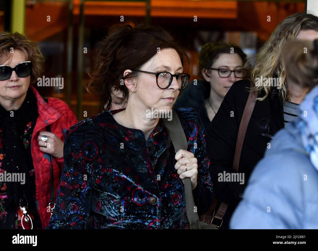 Former midwife Lisa Barrett departs the Supreme Court in Adelaide ...