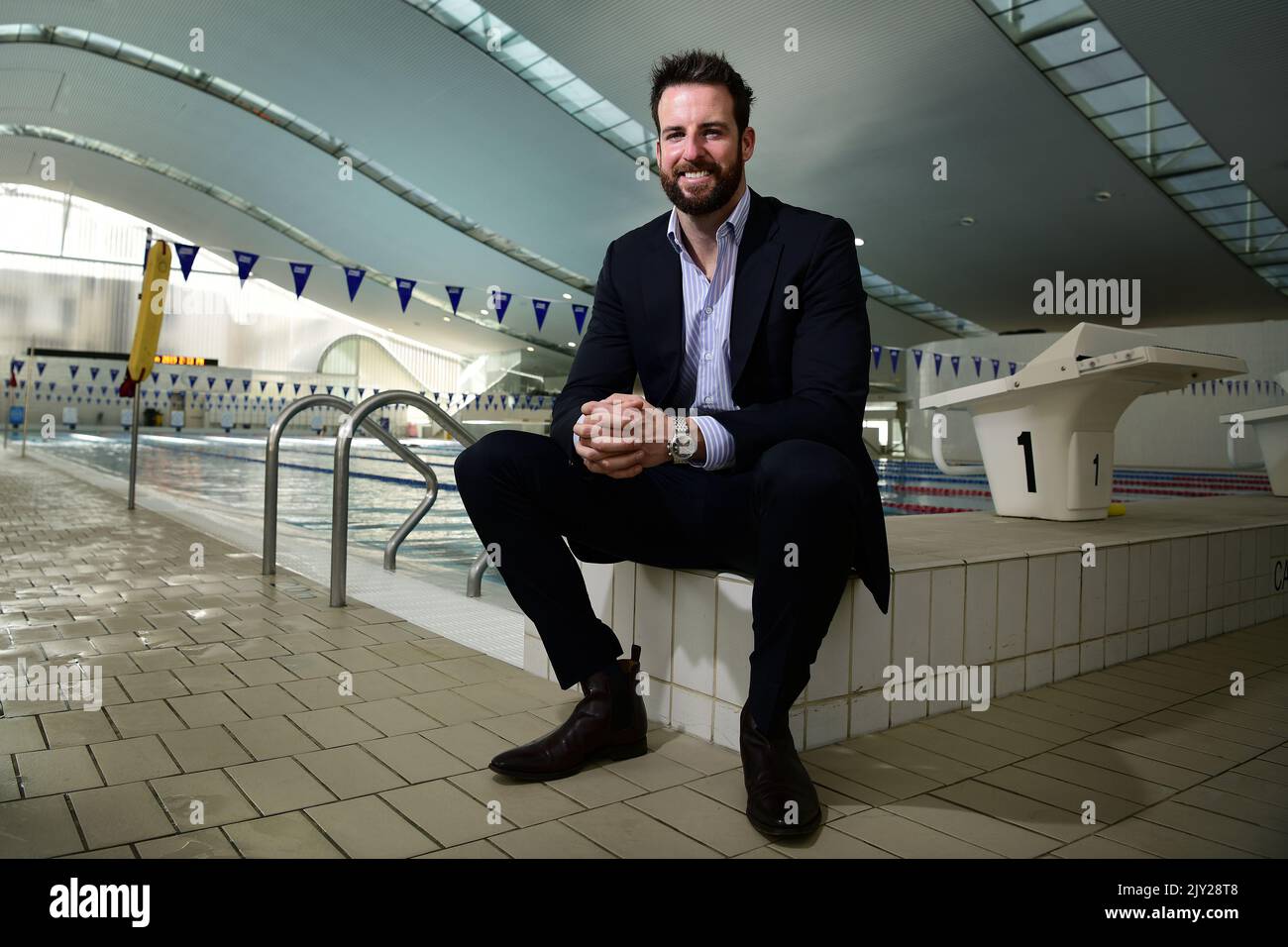 Australian swimmer James Magnussen poses for a photograph inside the ...