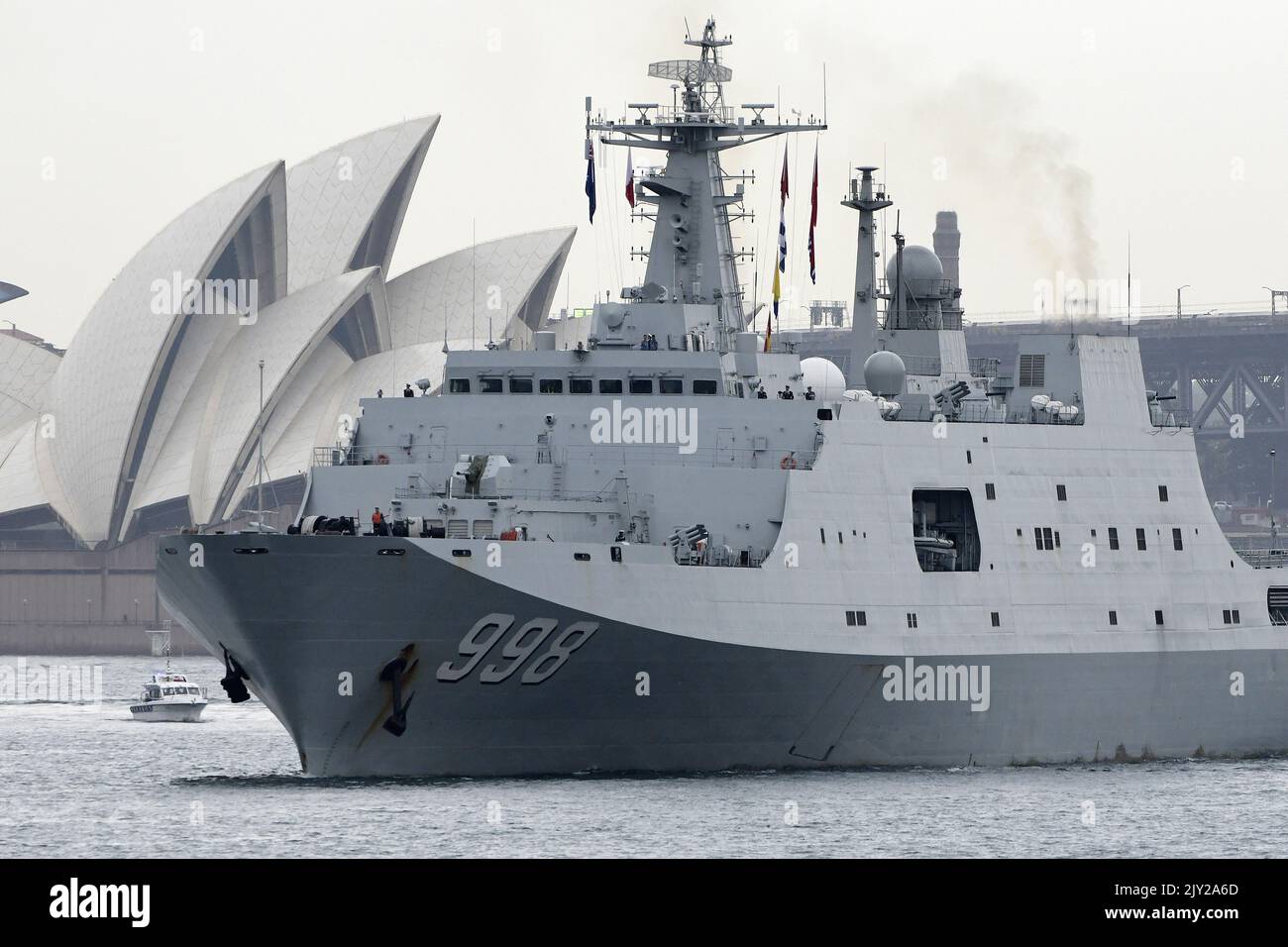 The Sydney Opera House can be seen as a Chinese Navel ship departs the ...