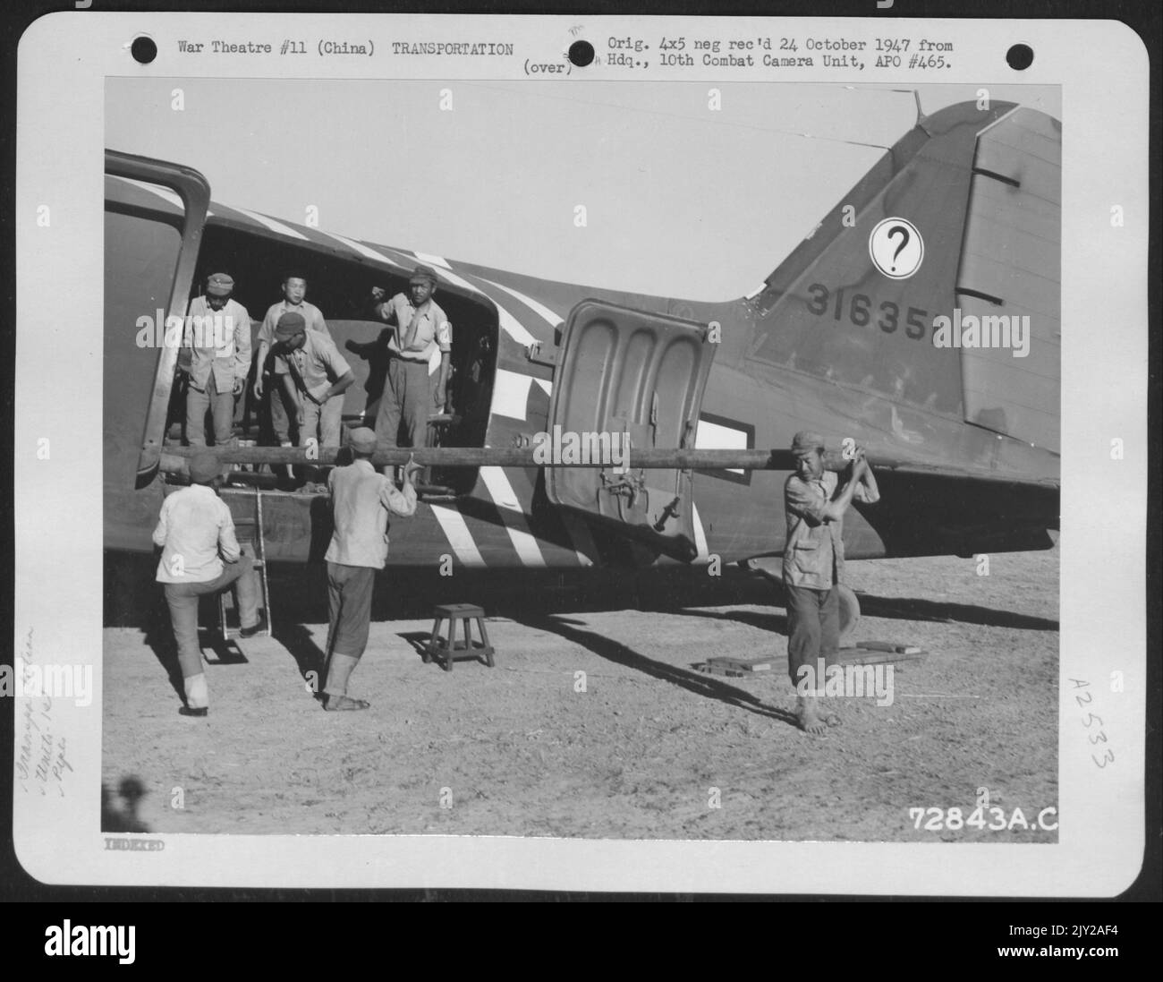Pipes Are Unloaded From A Douglas C-47 Of The 1St Air Commando Group At ...