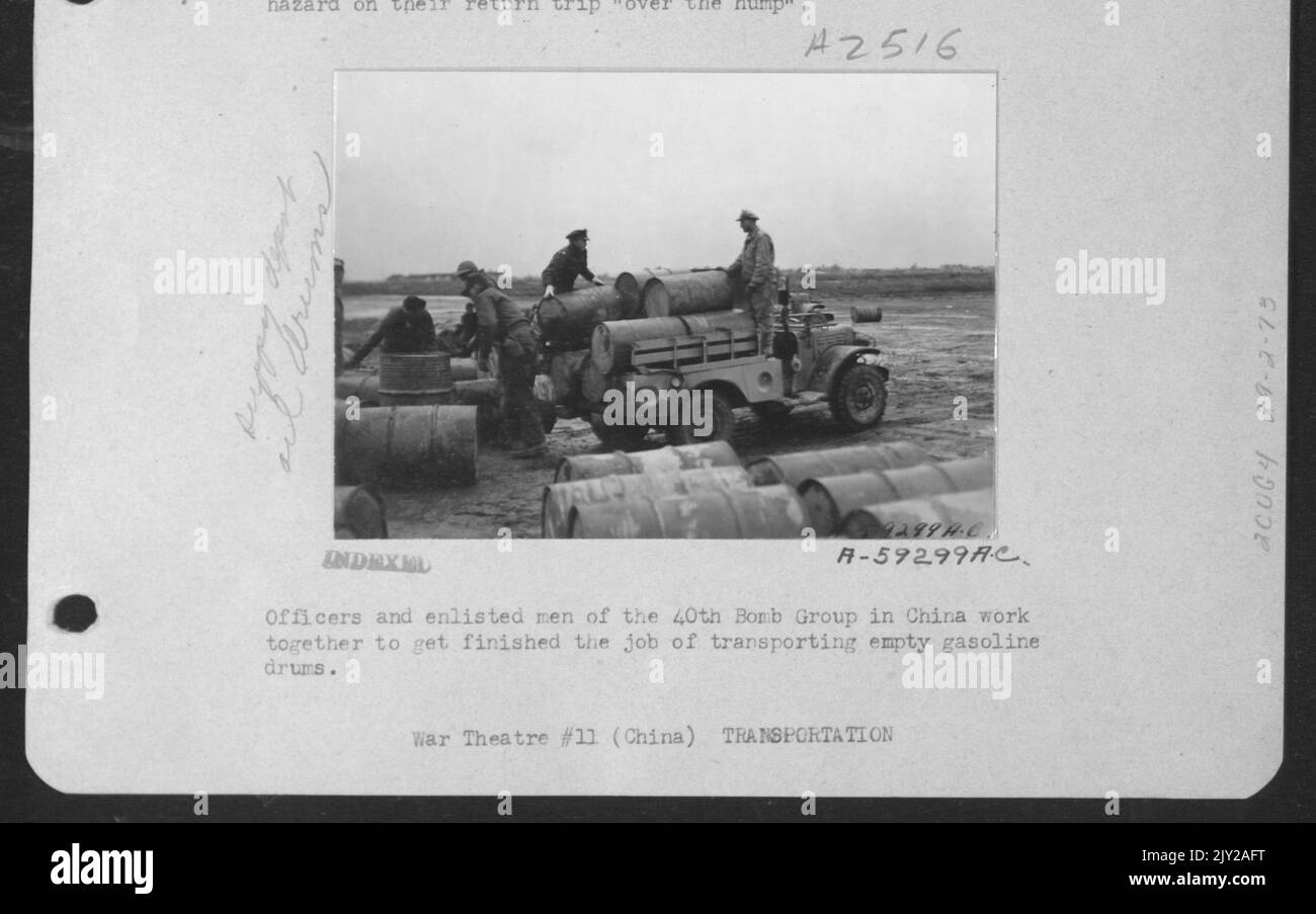 Officers And Enlisted Men Of The 40Th Bomb Group In China Work Together ...