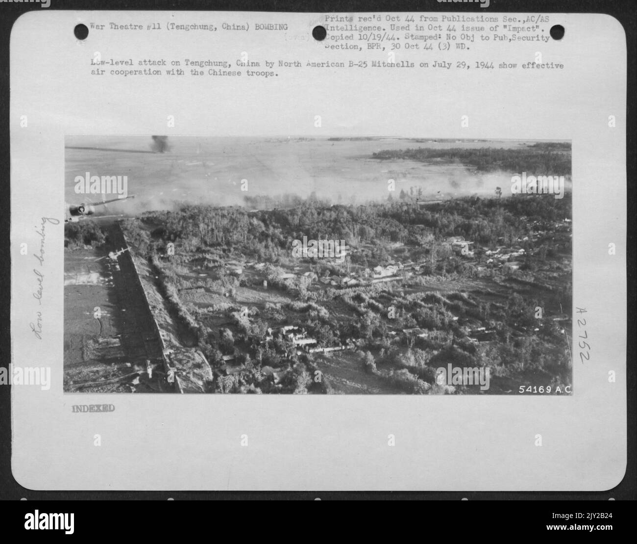 Low-level attack on Tengchung, China by North American B-25 Mitchells ...