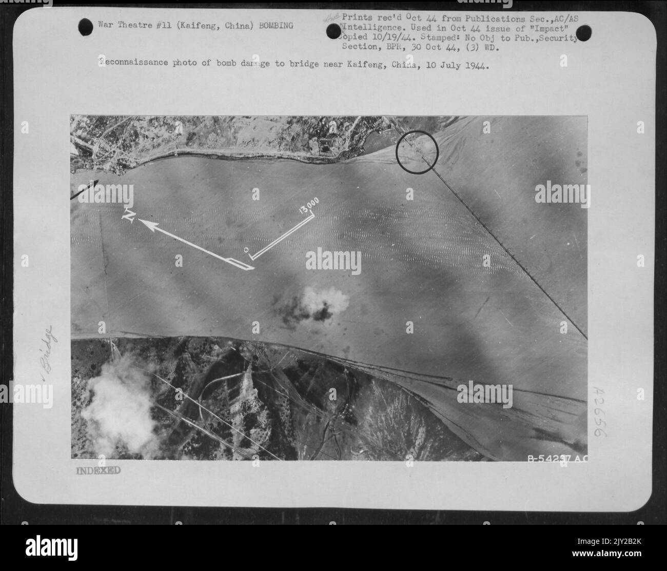 Reconnaissance photo of bomb damage to bridge near Kaifeng, China, 10 ...