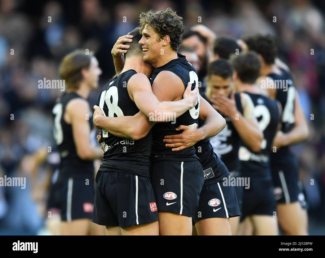 Charlie Curnow (right) and David Cuningham of the Blues react after the ...