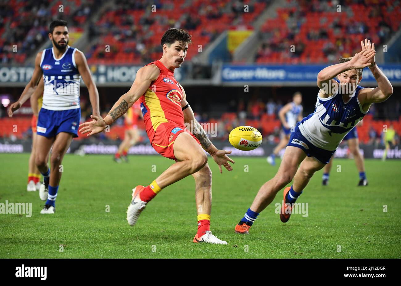 Alex Sexton of the Suns kicks during the Round 12 AFL match between the ...