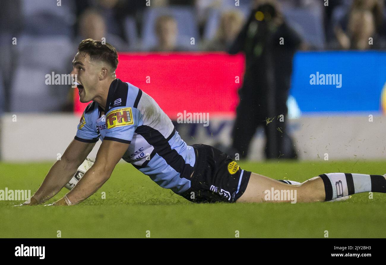 Kyle Flanagan of the Sharks scores during the Round 13 NRL match ...