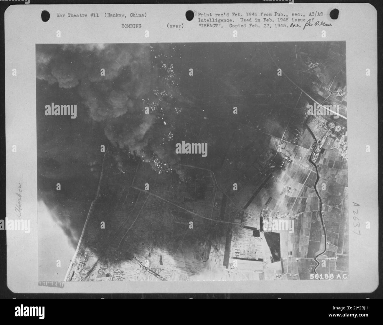 Large industrial and dock area running along the waterfront of Hankow ...