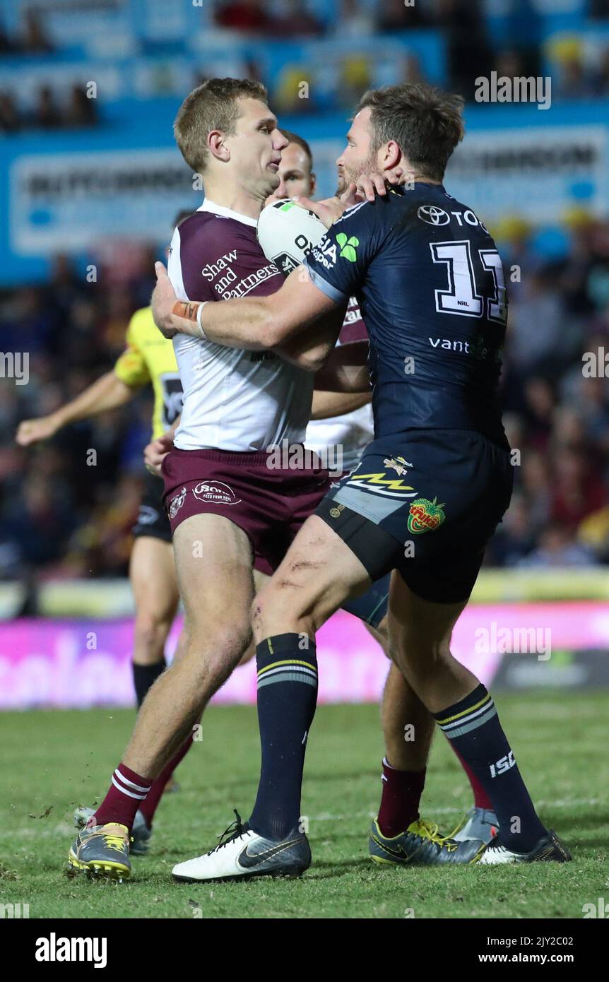 Kane Elgey of the Sea Eagles and Gavin Cooper of the Cowboys during the ...